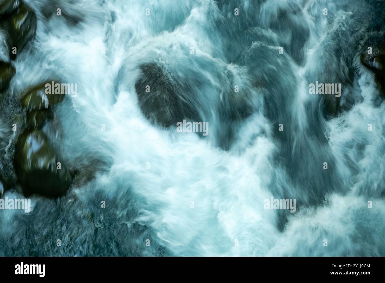 Water Swirls Around and Rushes Over Boulders In Hoh River in Olympic ...