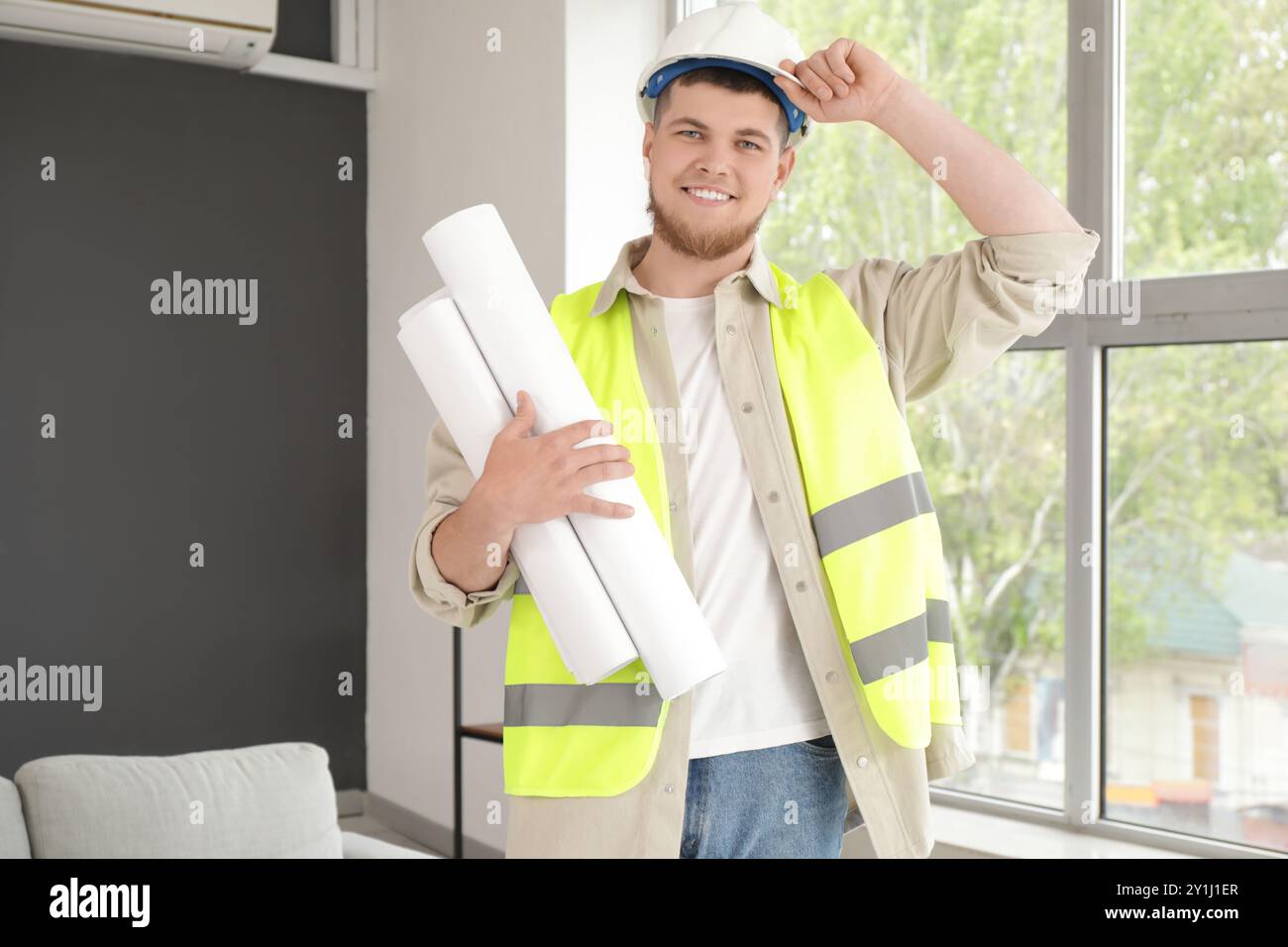 Male contractor house plans hi-res stock photography and images - Alamy