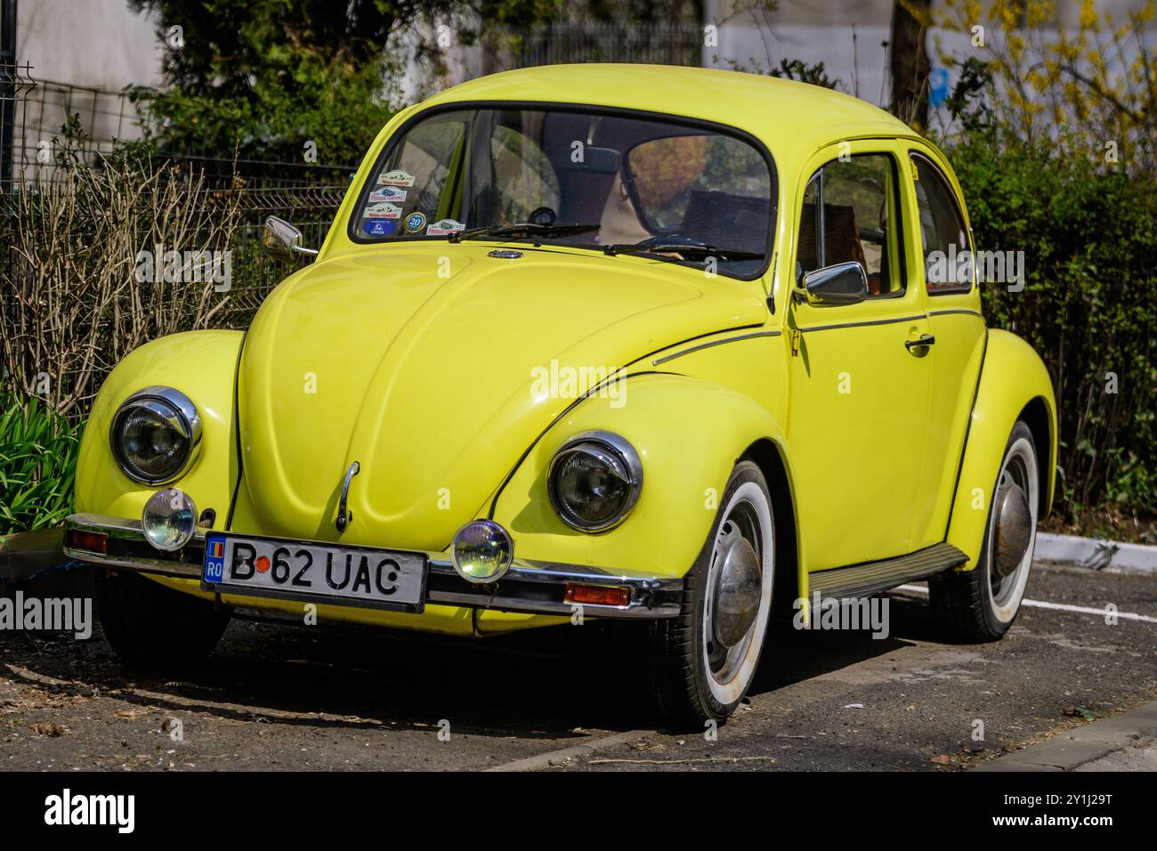 Bucharest, Romania, 2 April 2021 Old retro yellow Volkswagen Beetle ...