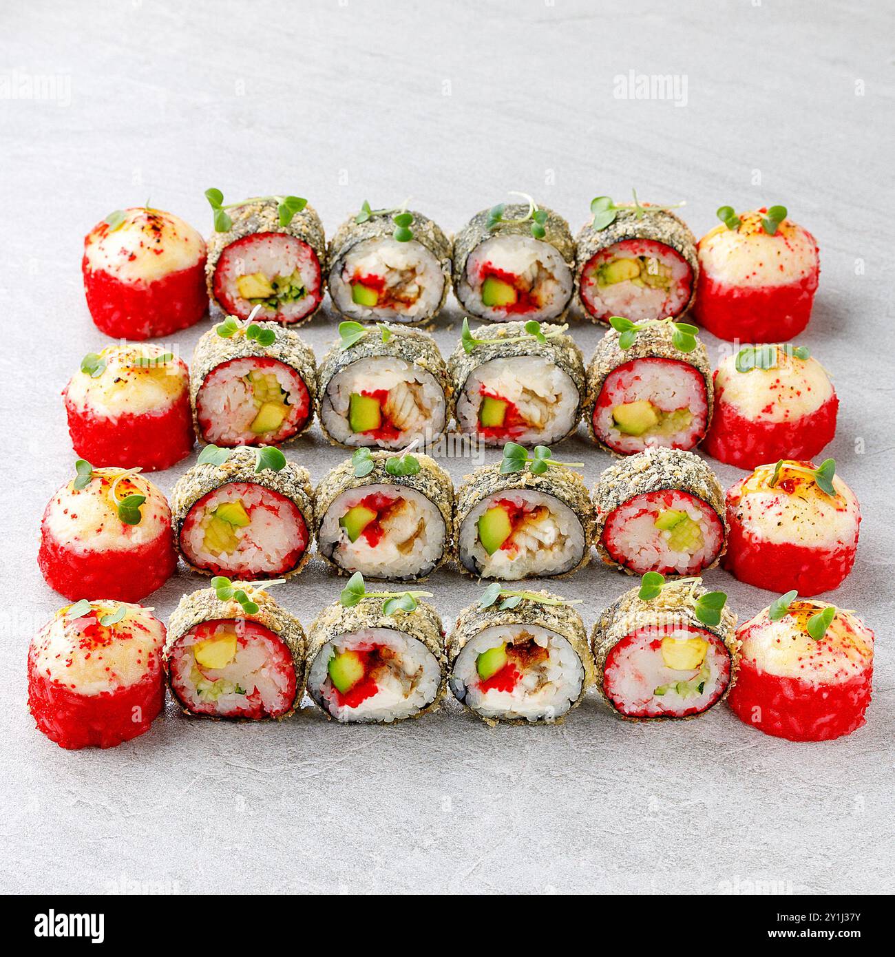 Japanese sushi tempura maki crab meat and tobiko roll on slate ...