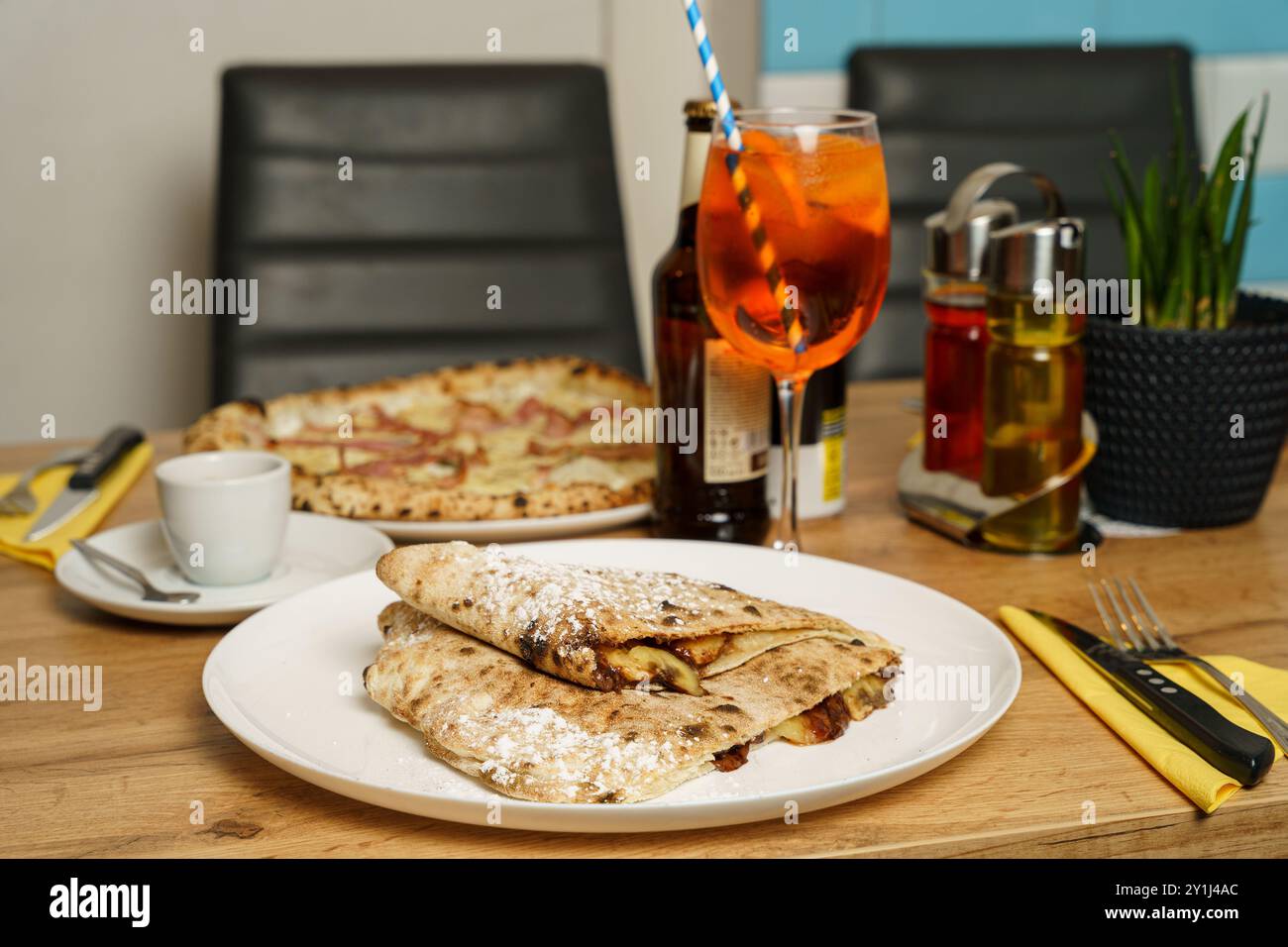 Italian dessert - calzone filled with chocolate, banana and powdered ...