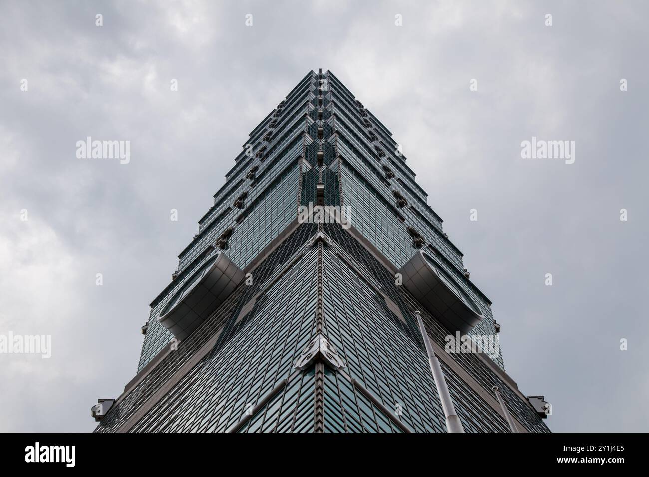 The landmark Taipei 101 under dramatic clouds during a rainstorm in ...
