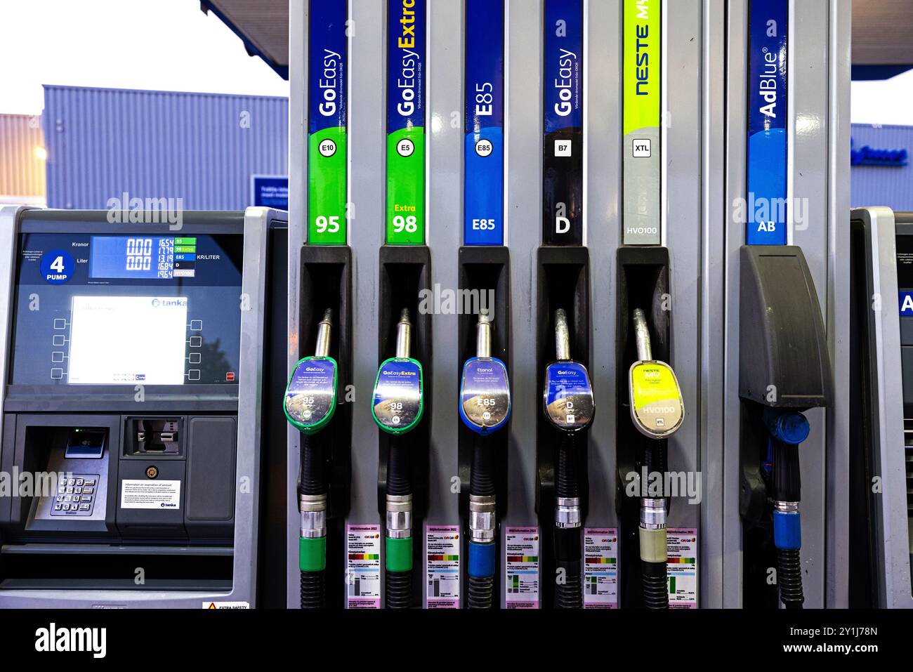 Different kinds of fuel pumps at a gas station Stock Photo - Alamy