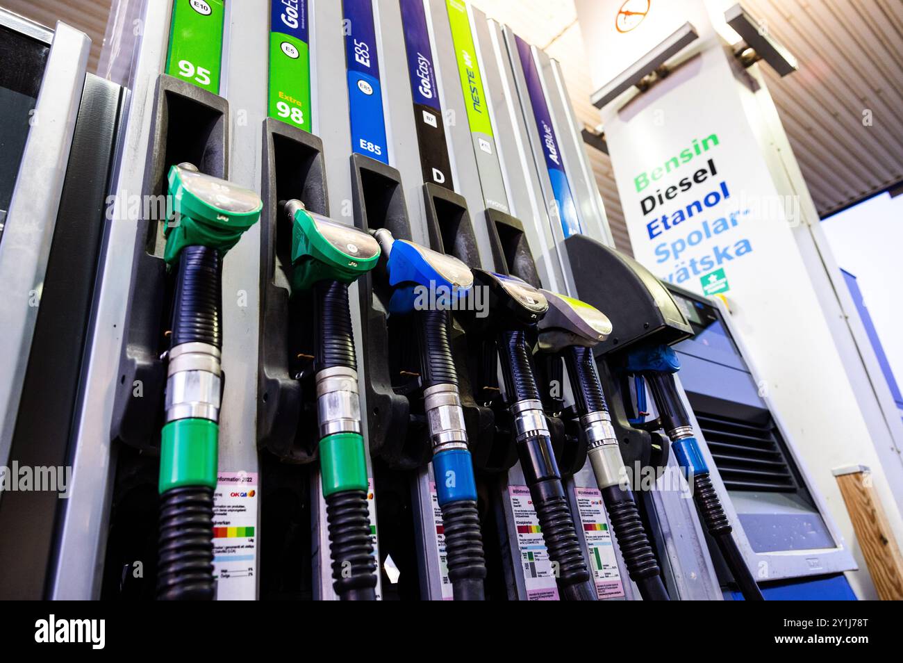 Different kinds of fuel pumps at a gas station Stock Photo - Alamy