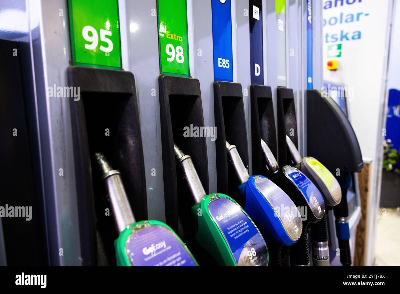Different kinds of fuel pumps at a gas station Stock Photo - Alamy