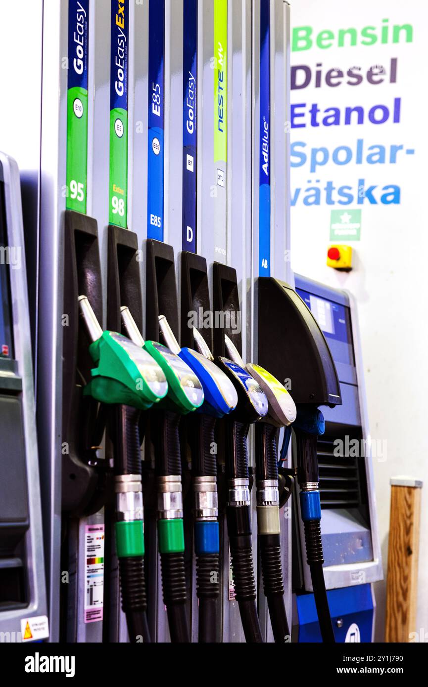 Different kinds of fuel pumps at a gas station Stock Photo - Alamy