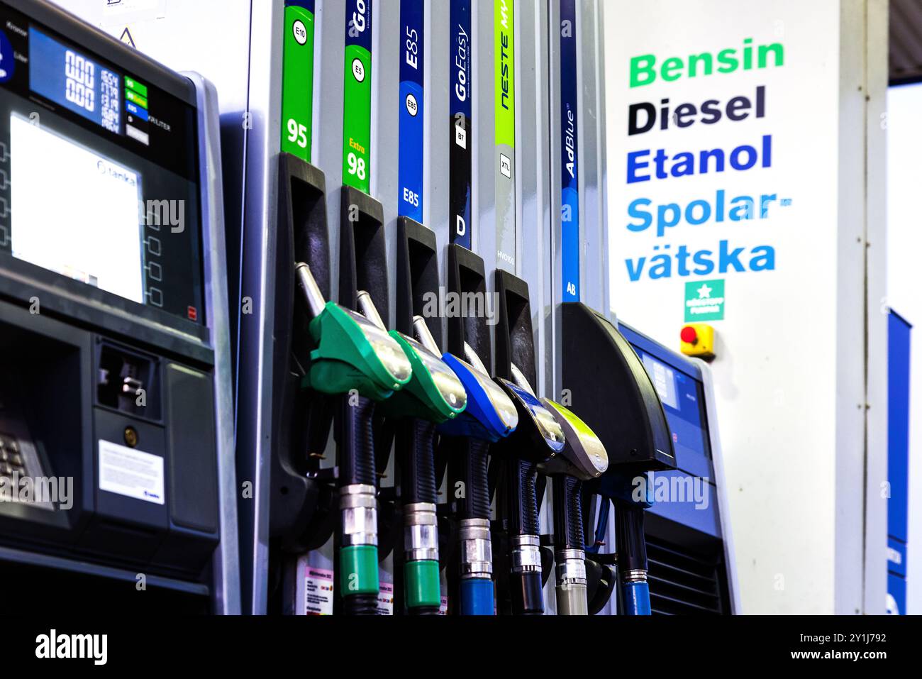 Different kinds of fuel pumps at a gas station Stock Photo - Alamy