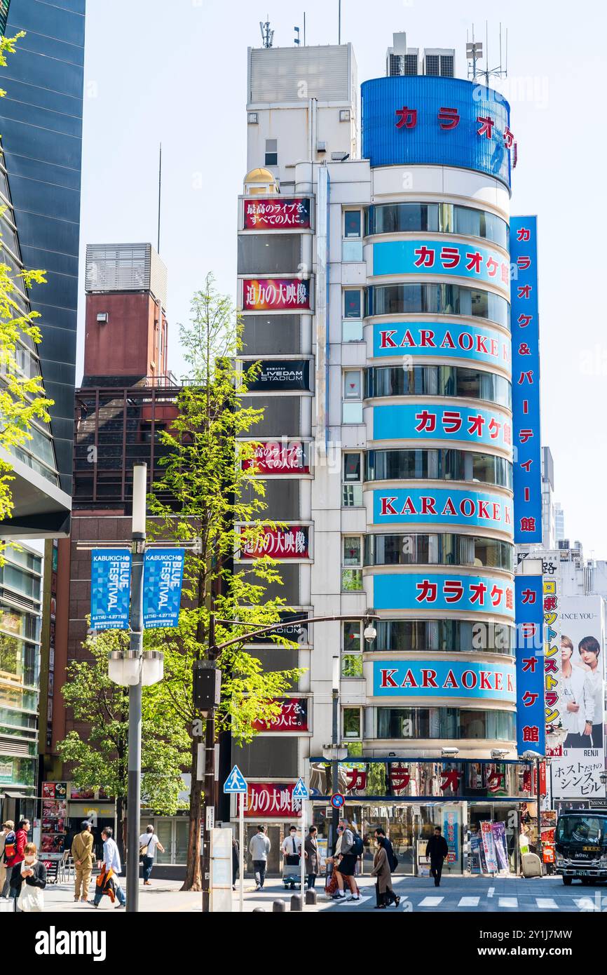 Distinctive blue and white seven story Karaoke tower building on the ...