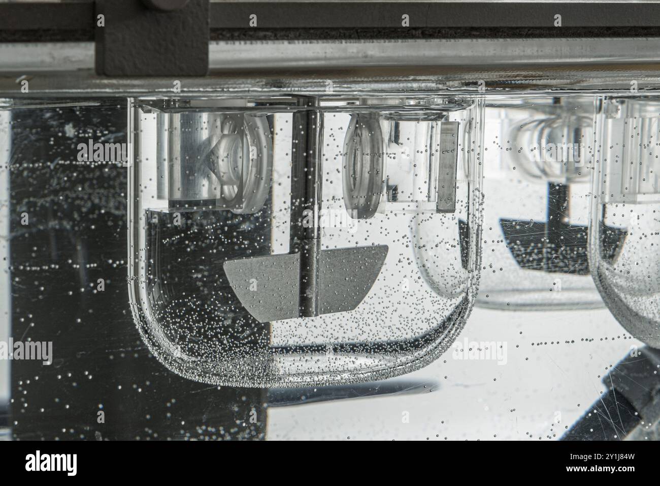 Paddle mixing clear liquid in chemistry lab, New Jersey, USA Stock ...