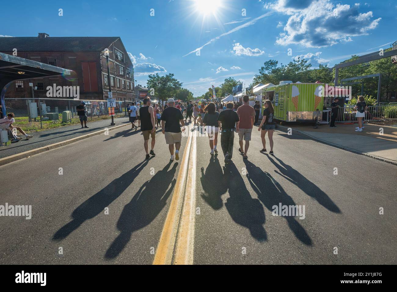 People walking shadow street day hi-res stock photography and images ...