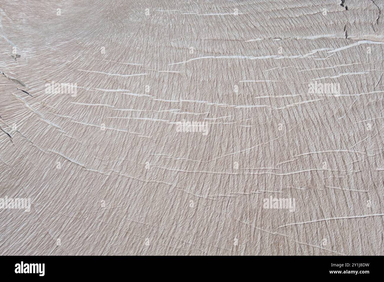 Mer de Glace glacier in close-up showing layer of red Sahara sand dust ...