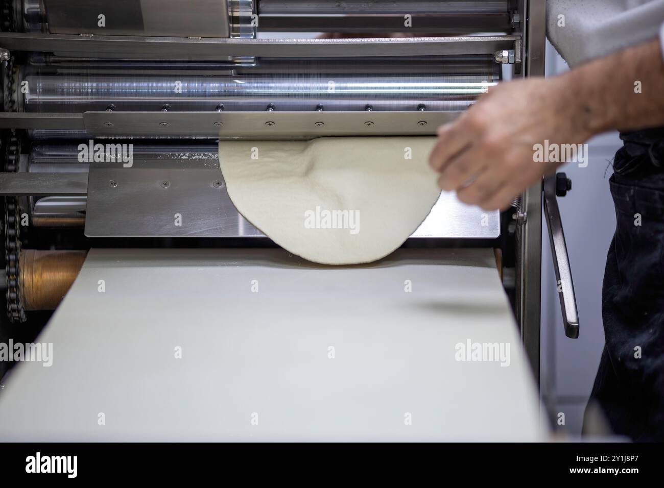 Industrial Fast Fully Automatic Roti Maker Machine Stock Photo - Alamy