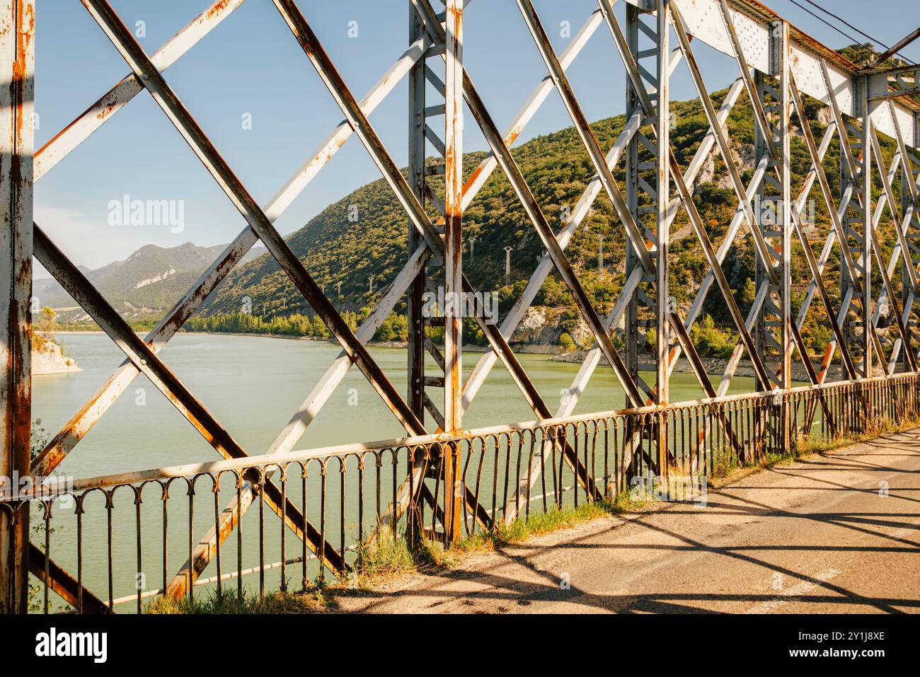 Rustic Charm of the Puente de la Peña: A Vintage Iron Bridge Over ...