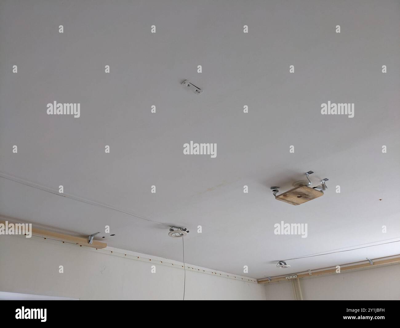marking on the ceiling. Installation of a stretch ceiling Stock Photo ...
