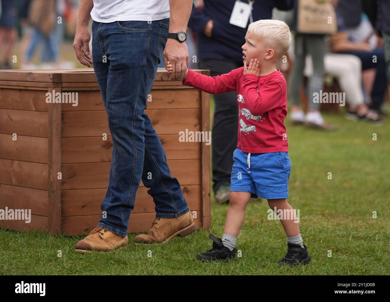 Mike Tindall with his son, Lucas, at the Defender Burghley Horse Trials ...