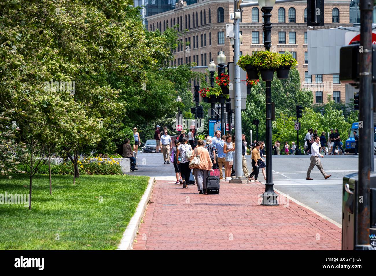 People along the streets in the Back Bay upscale shopping district in ...