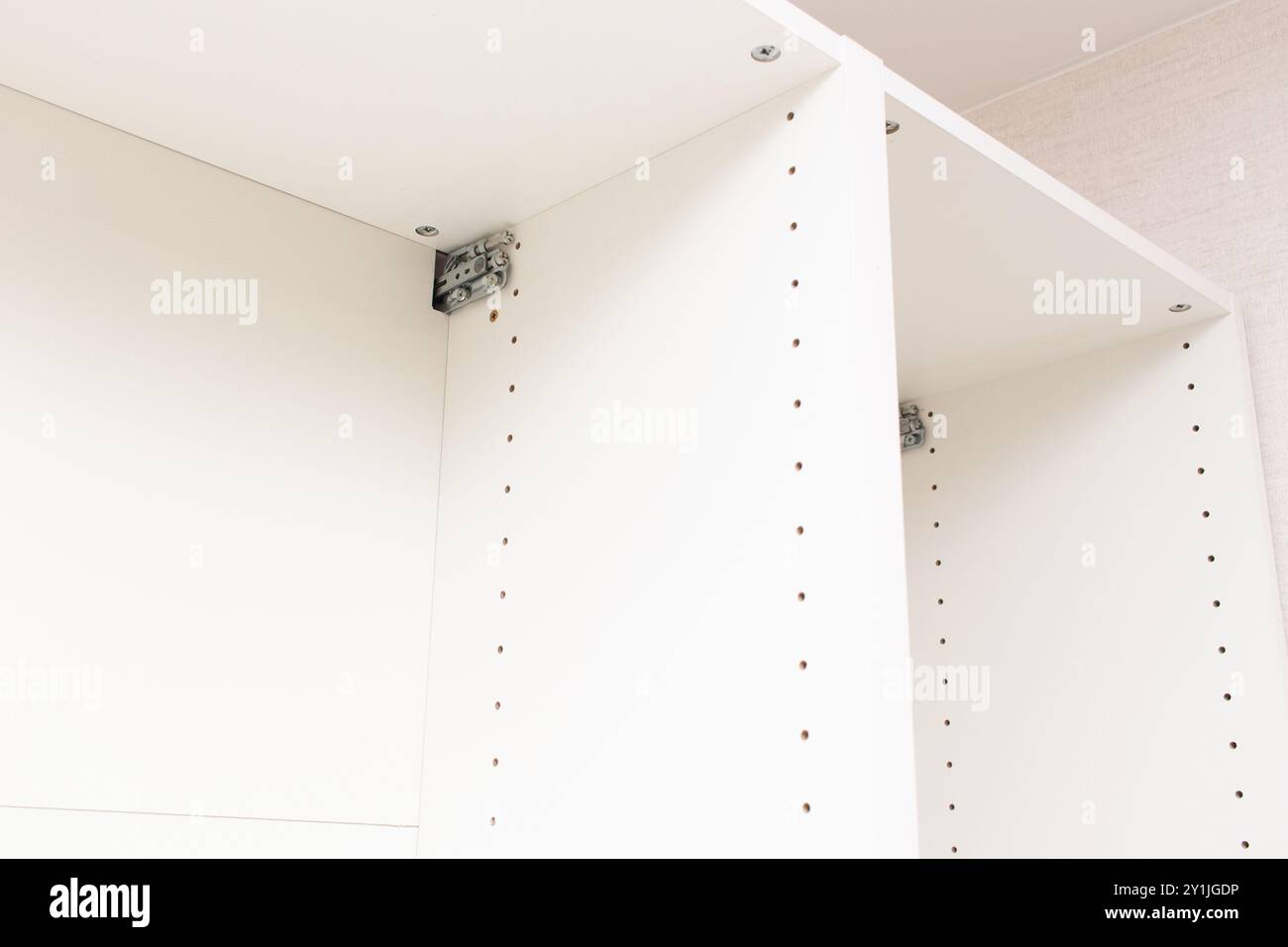 Assembling Kitchen Cabinets. Renovated kitchen interior Stock Photo - Alamy