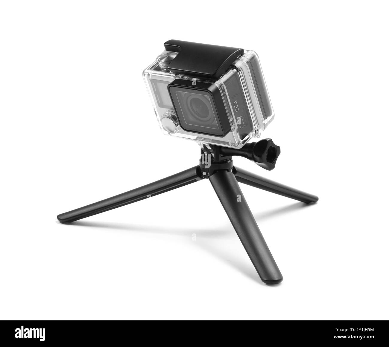 Modern action camera and tripod isolated on white Stock Photo - Alamy