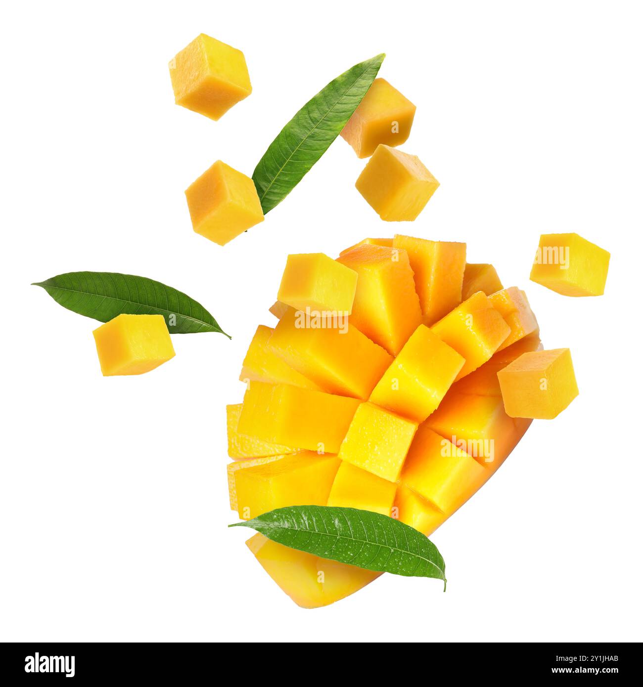 Sweet fresh mango cut in cubes flying on white background Stock Photo ...
