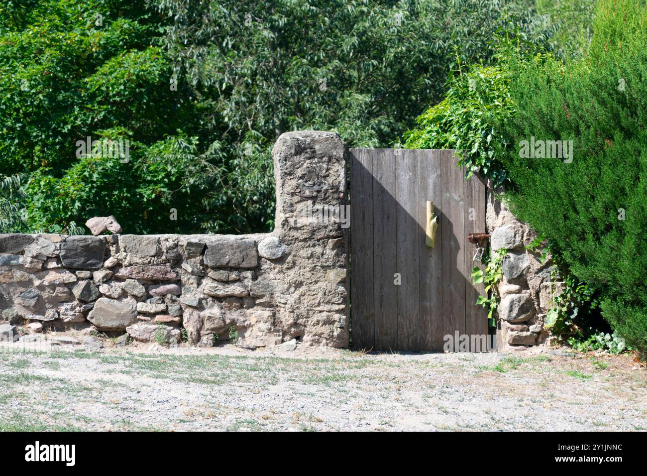 Gate delimiting an agricultural field Stock Photo - Alamy