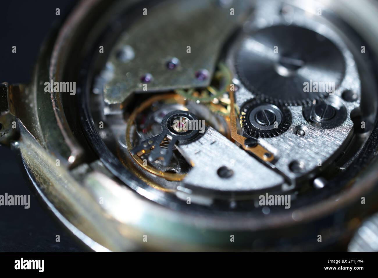 Mechanism of vintage wrist watch on black background, closeup Stock ...