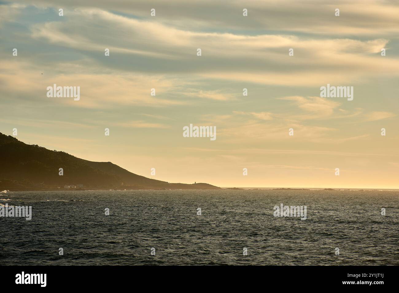 View of Cabo Silleiro and its breakwater as seen from Bayona, Galicia ...