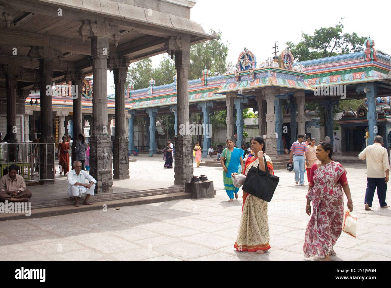 People moving about in a hindu temple hi-res stock photography and ...