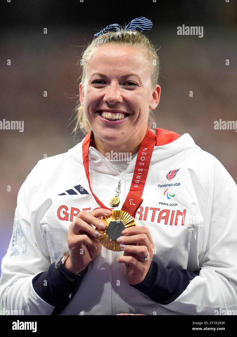 Great Britain's Hannah Cockroft on the podium with the gold medal after ...