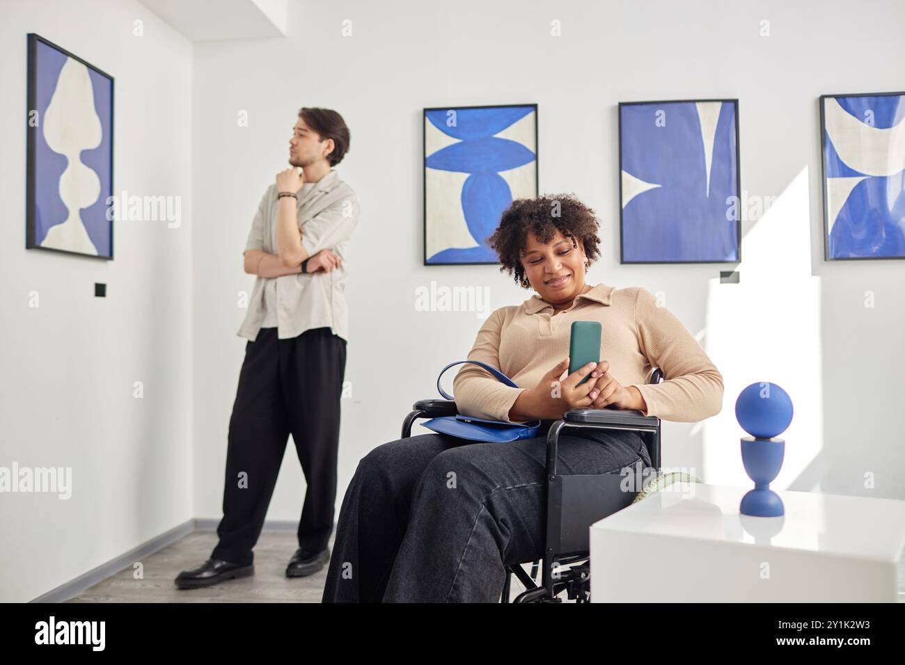 Portrait of smiling Black woman with disability using wheelchair in ...