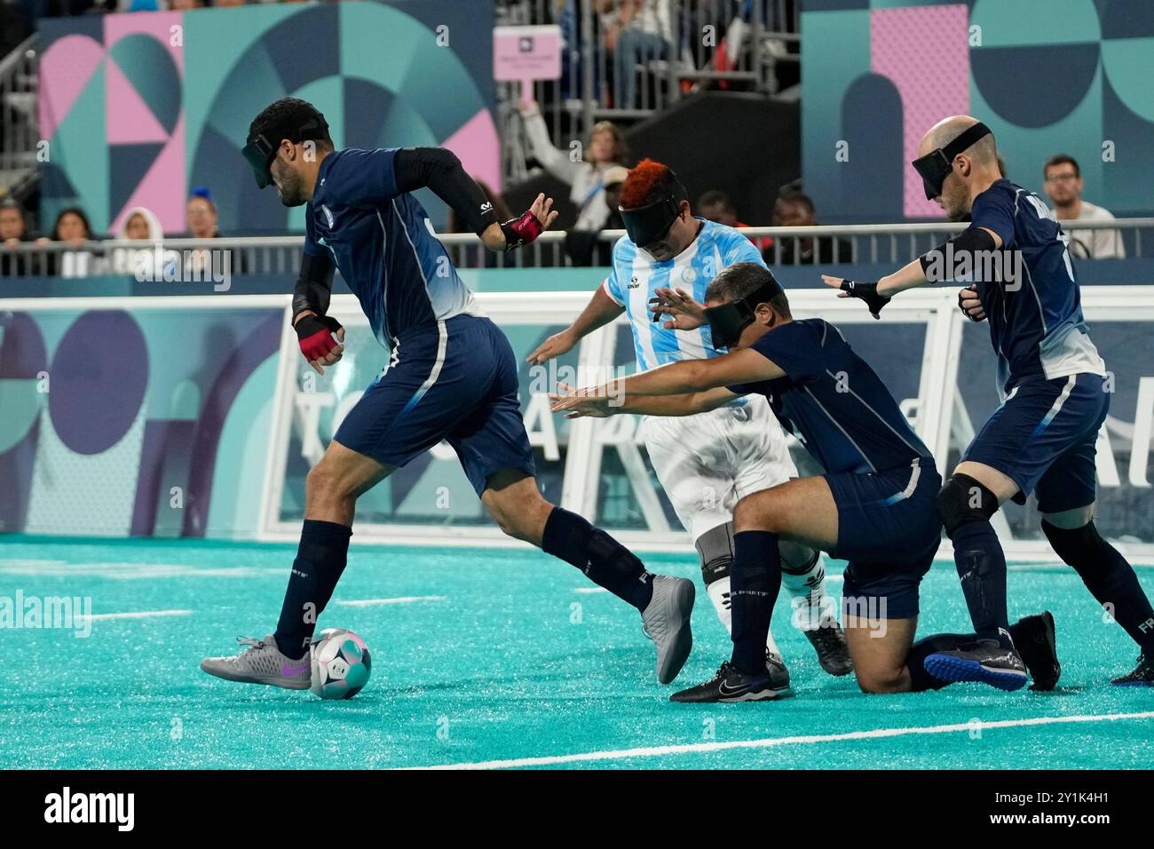 France's Hakim Arezki drives the ball during the blind football gold ...