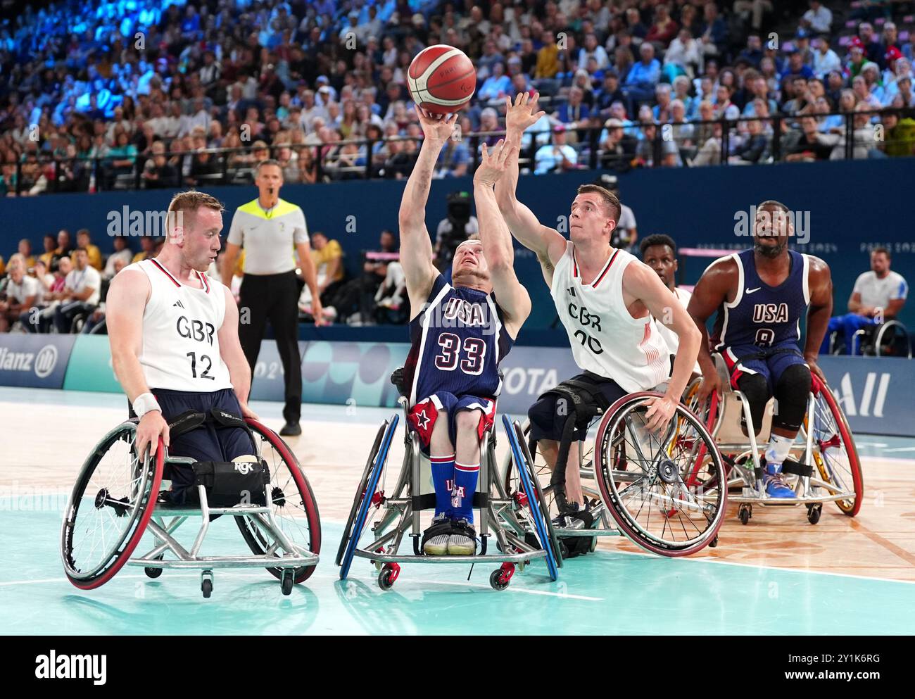 USA's John Boie and Great Britain's Peter Cuask (right) in action ...