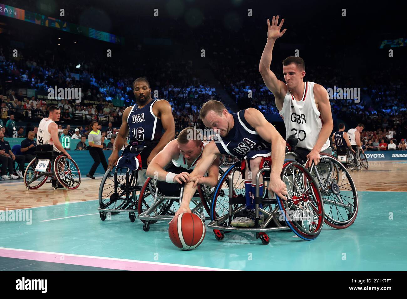 John Boie of the U.S., foreground right, and Britain's Ben Fox fight ...