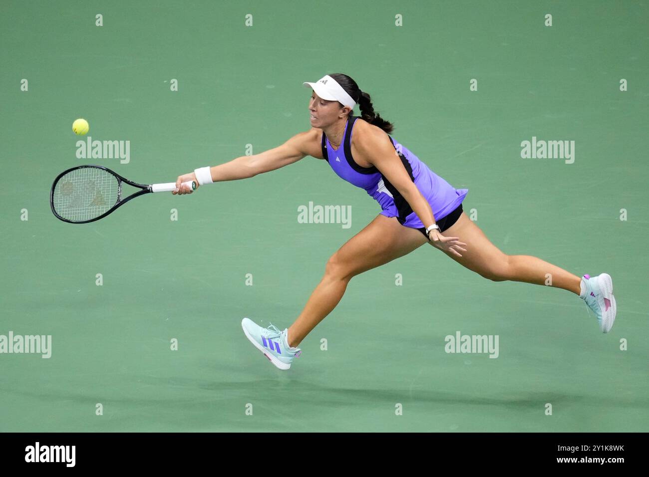 Jessica Pegula, of the United States, returns a shot to Aryna Sabalenka ...