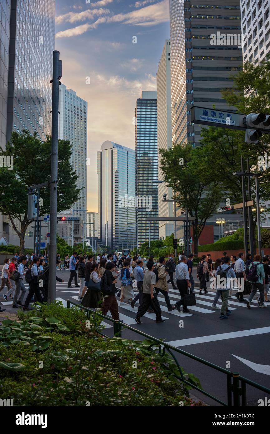 Tokyo, Japan, Jun 14, 2024: Communters walk to work in Shinagawa City ...