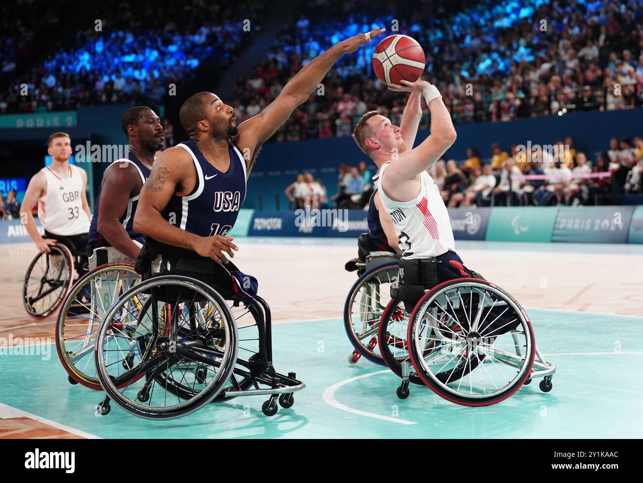 USA's Trevon Jenifer and Great Britain's Gregg Warburton in action ...