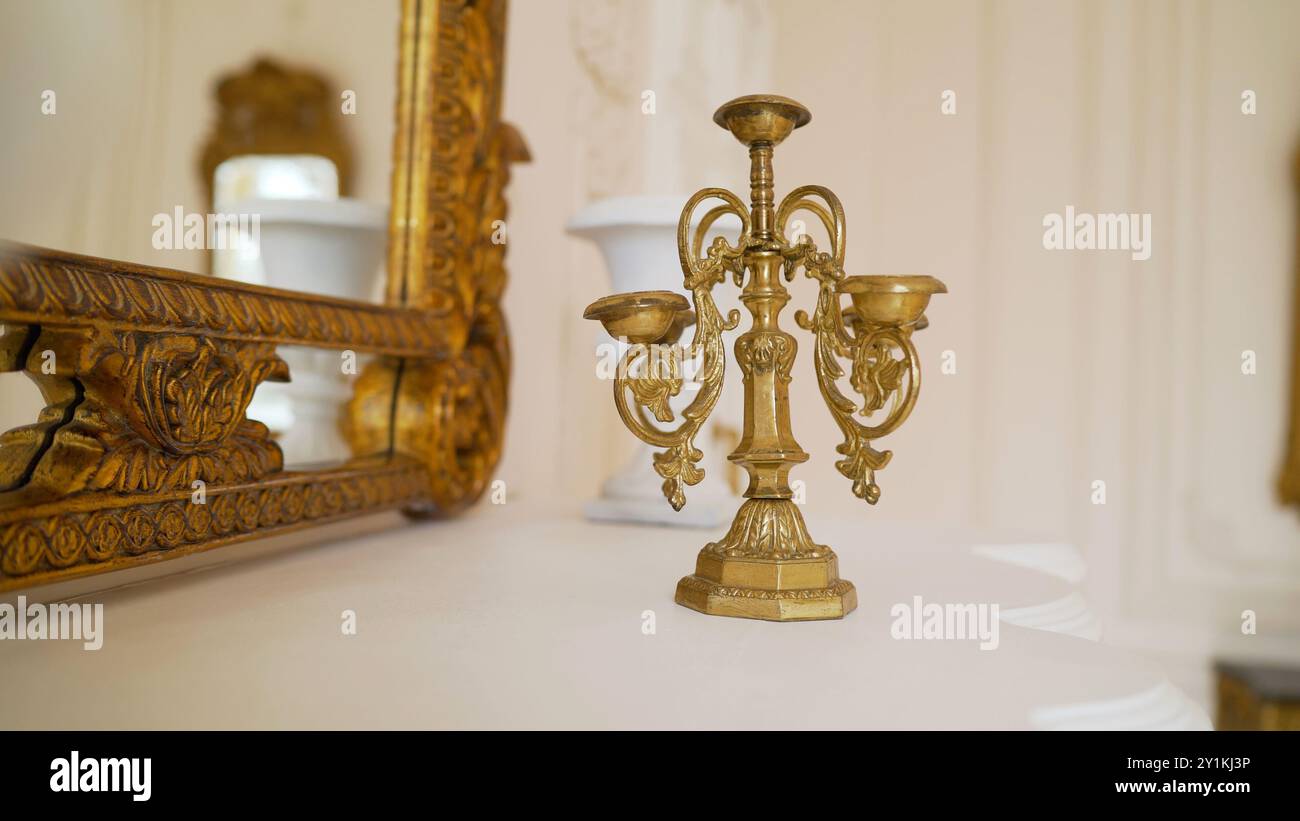 Classic bronze candlestick. One antique candlestick, bronze candle tree ...