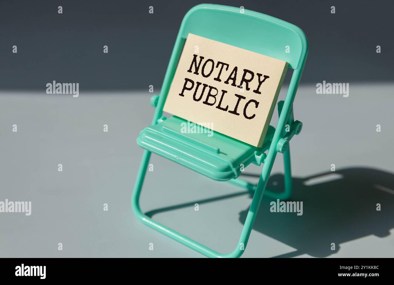 white paper with text Notary Public on a yellow background with ...