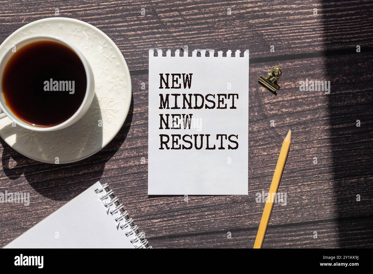 New mindset new results is standing on a paper, coaching strategy ...
