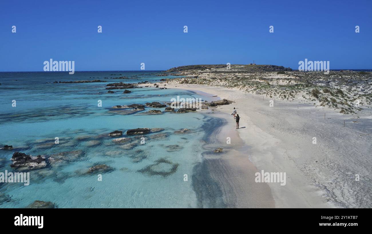 Person strolls on sandy shore hi-res stock photography and images - Alamy