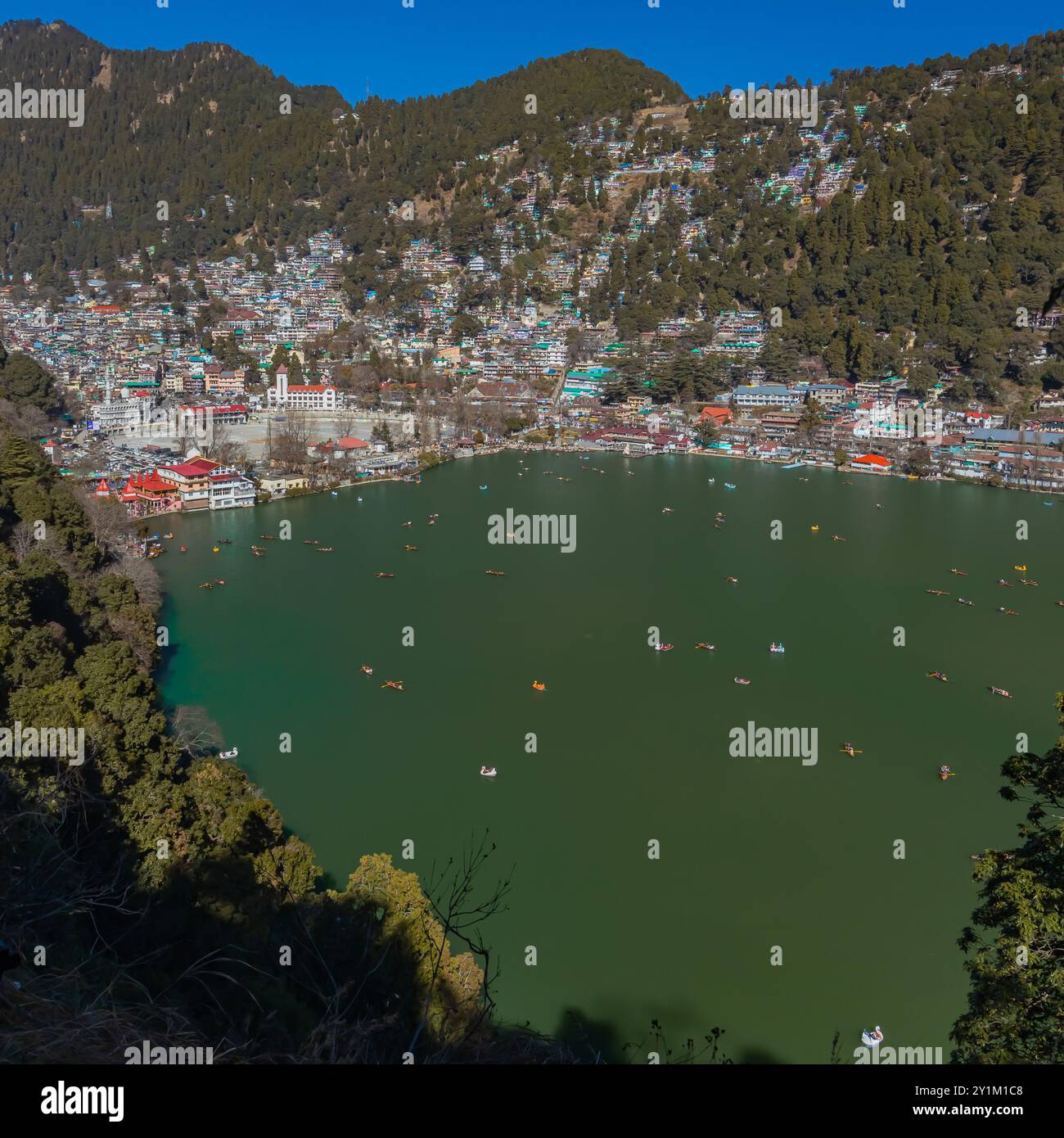 An aerial view of Naini lake and town at Nainital, India, a famous ...