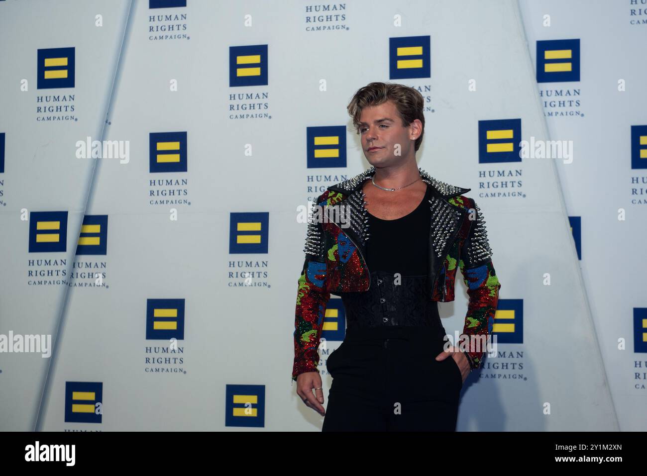 Actor Garrett Clayton walks the blue carpet at the 2024 Human Rights ...