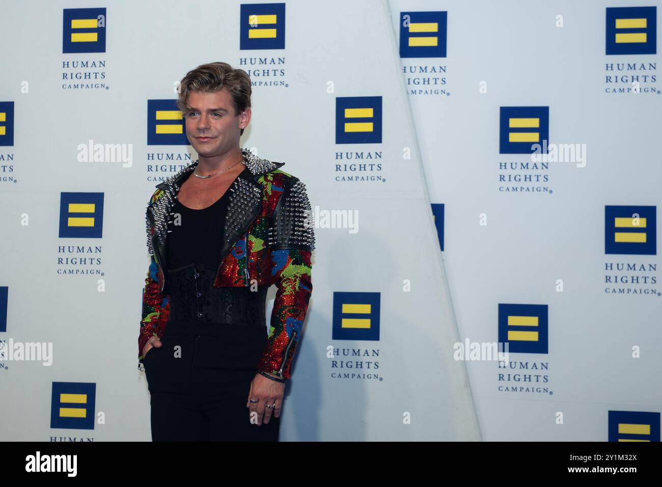 Actor Garrett Clayton walks the blue carpet at the 2024 Human Rights ...