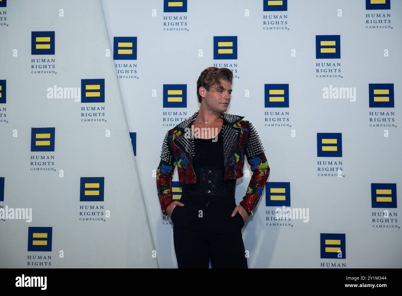 Actor Garrett Clayton walks the blue carpet at the 2024 Human Rights ...