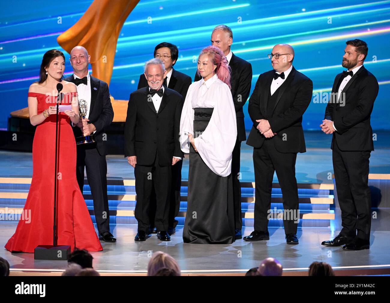 The team from "Blue Eye Samuri" accepts the Emmy for outstanding ...