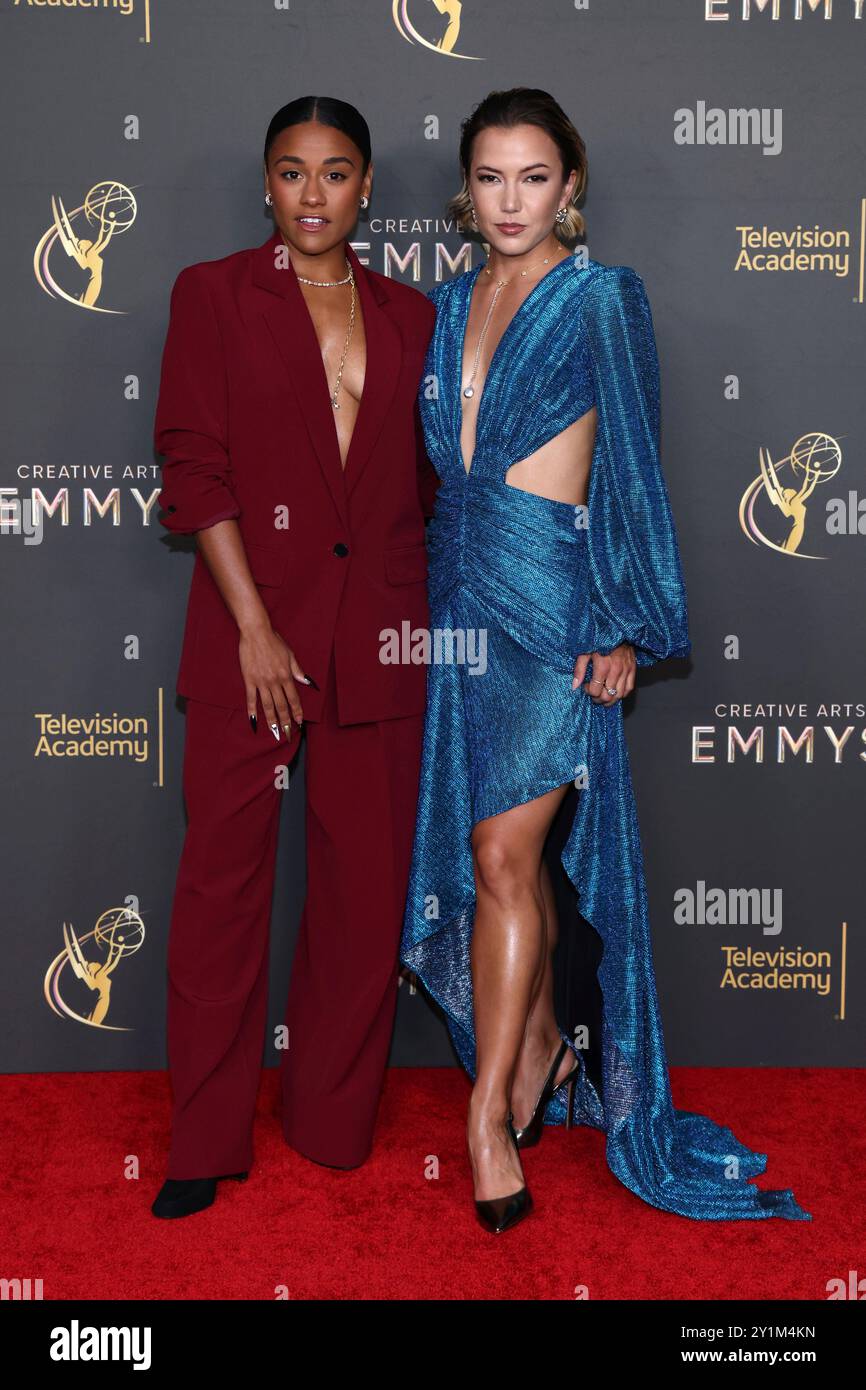 Ariana DeBose, left, and Morgan Marcell pose in the press room during ...