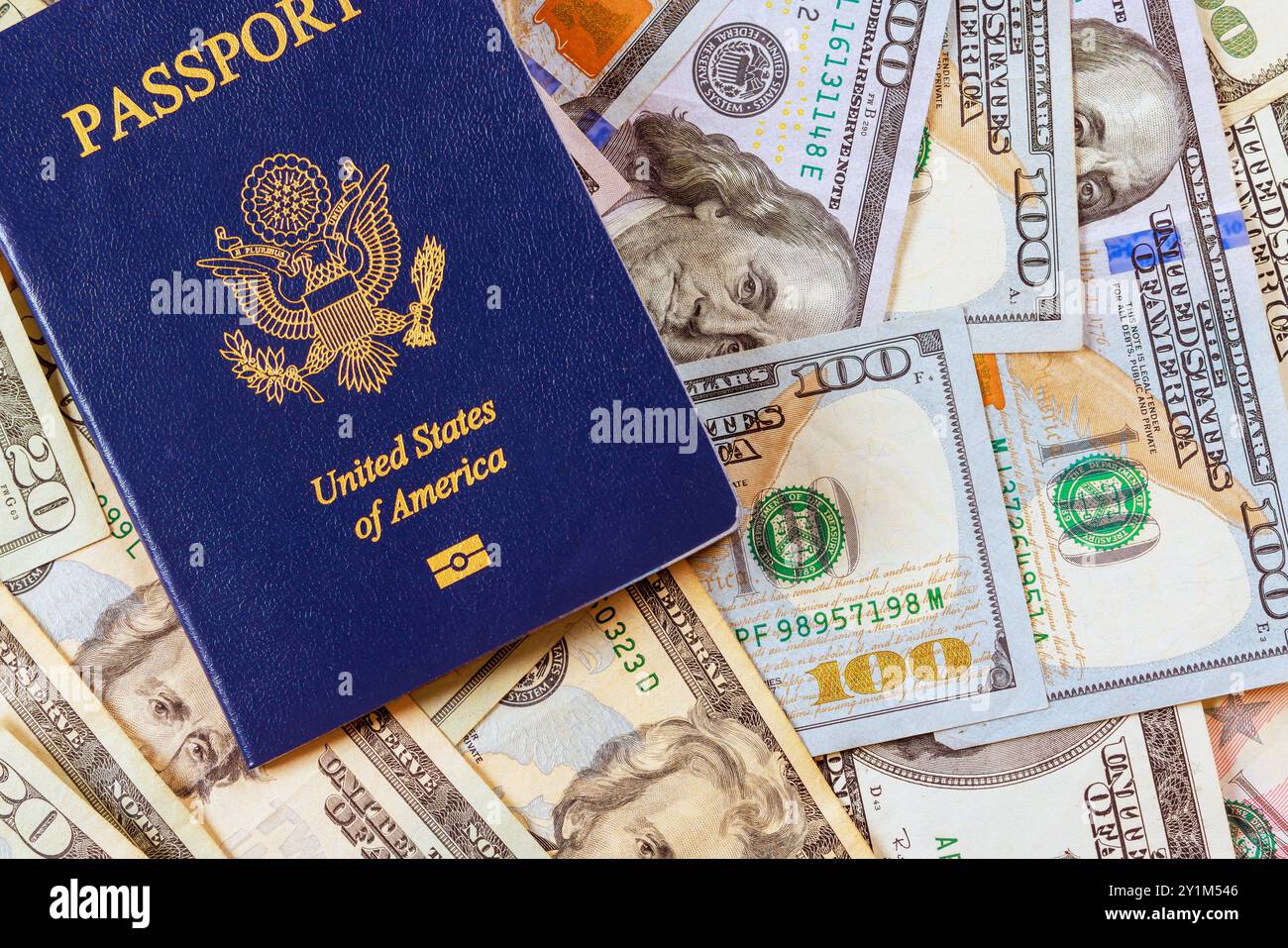 American passports on top US currency American dollar cash banknotes ...