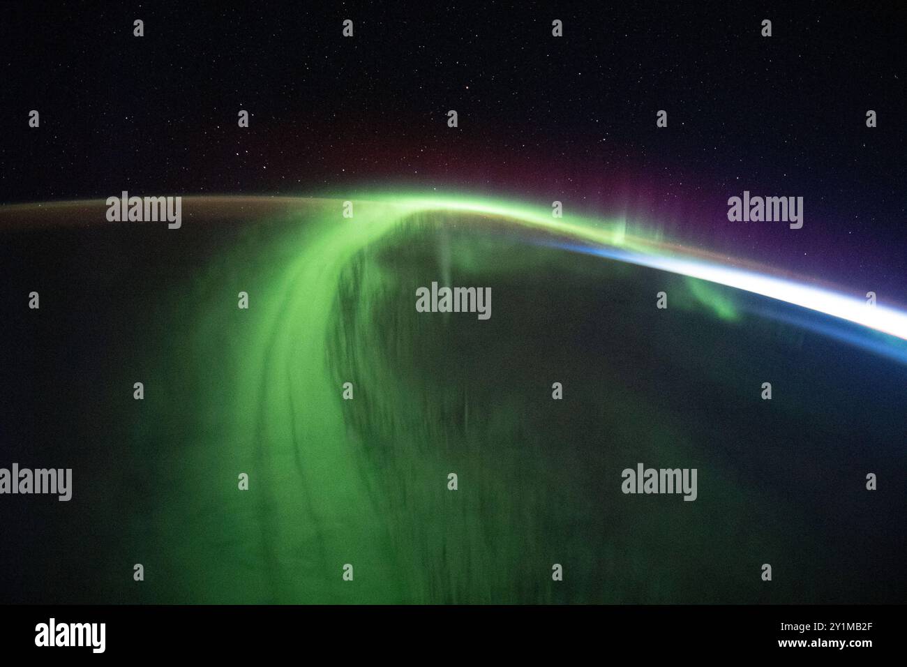 Earth Atmposhere. 11th Oct, 2021. A vivid aurora streams over the Earth ...