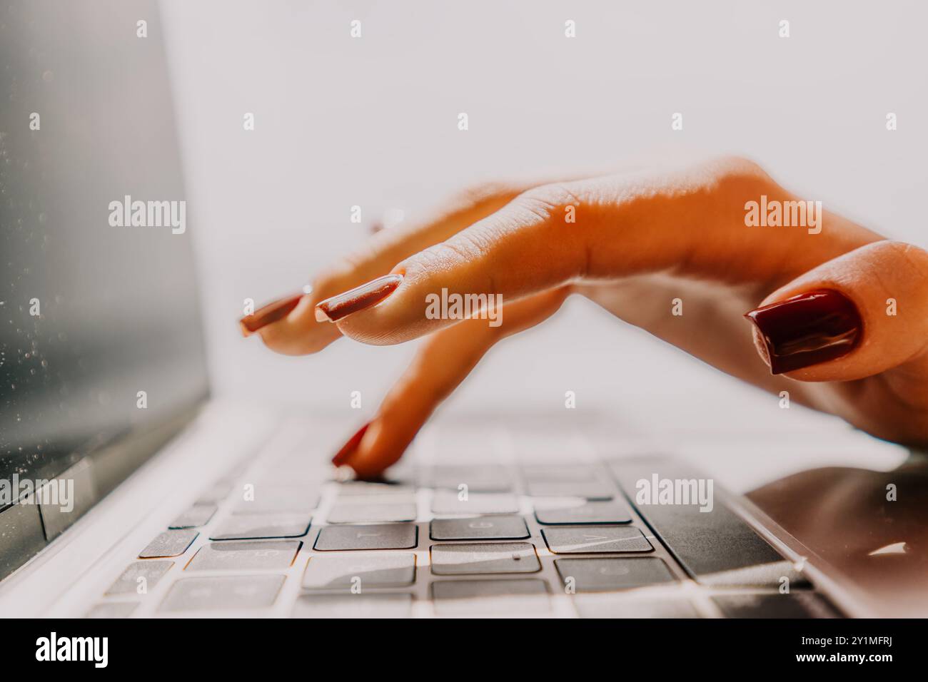 Hand Keyboard Typing Laptop - Close-up of a woman's hand typing on a ...