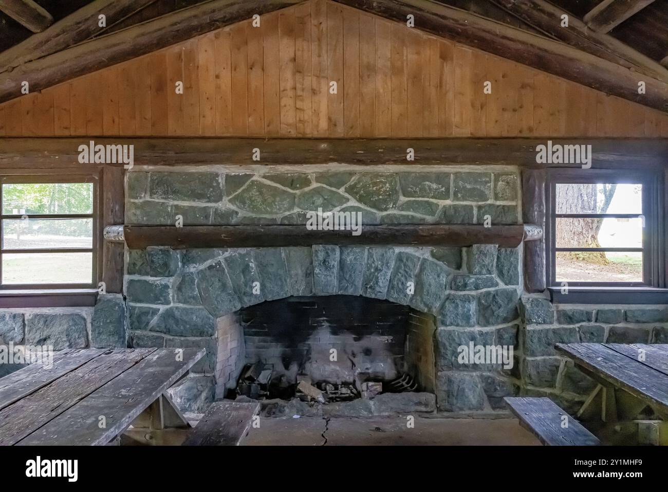 Fireplace details in a rustic park picnic pavilion built by the ...