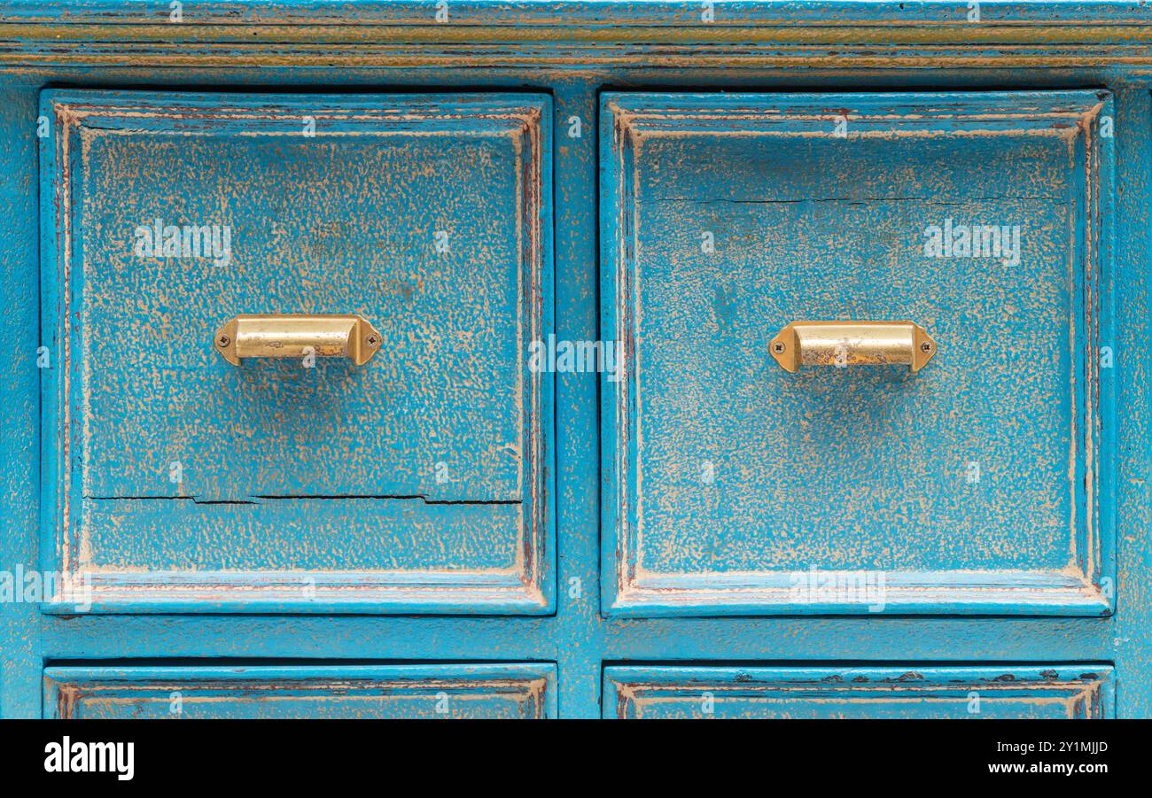 Antique chest of drawers with retro copper handle Stock Photo - Alamy